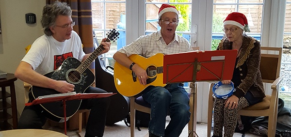 Residents being entertained by singers this afternoon - Rathside Care Home